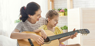 4 Ways Playing an Instrument Enhances Child Development